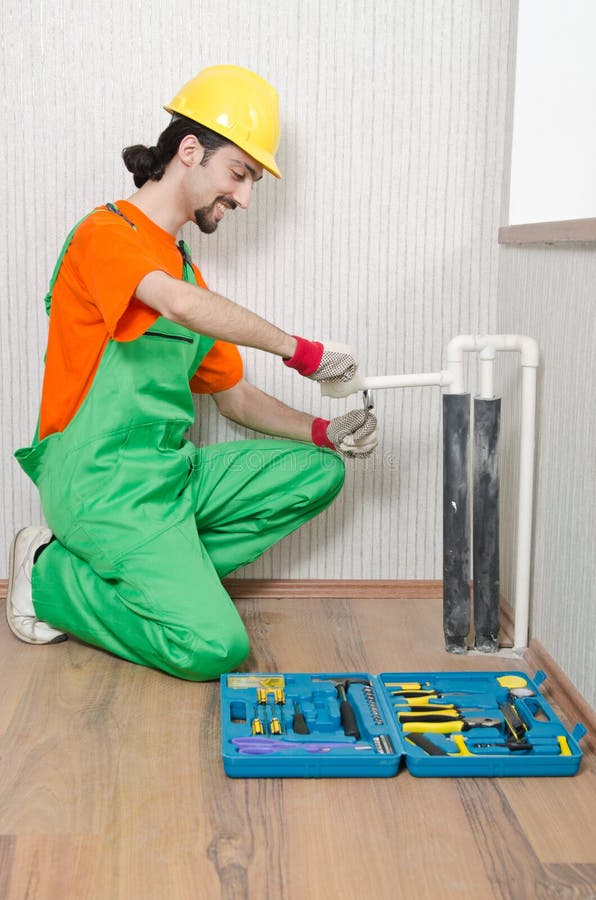 Plumber Working in Bathroom Stock Image - Image of plumber, male: 24869799