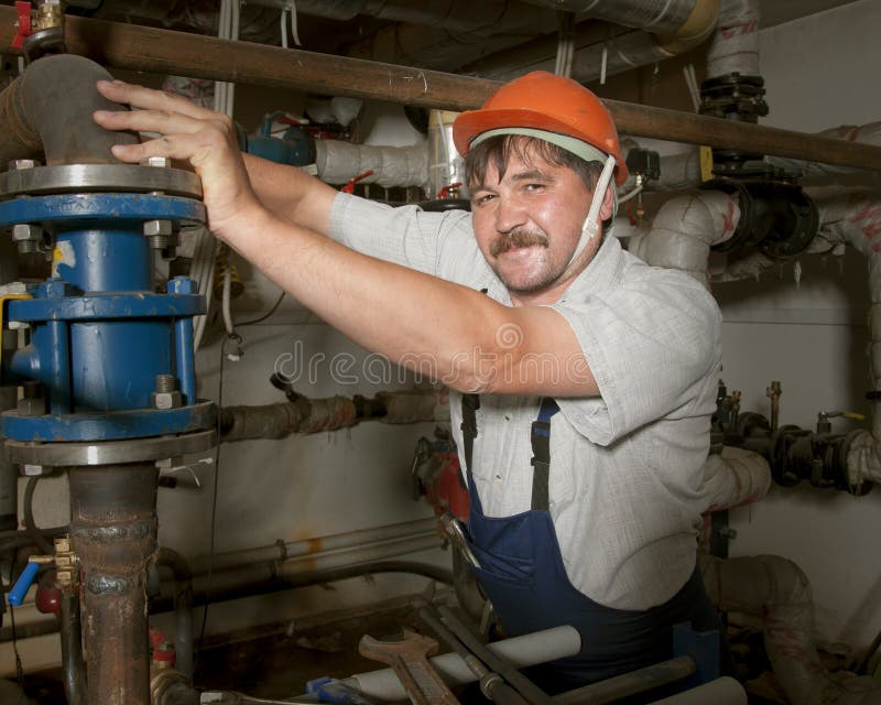 Plumber working stock image. Image of mature, installing - 32565803