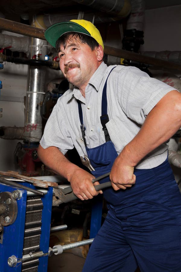 Plumber working stock photo. Image of male, janitor, work - 32565878