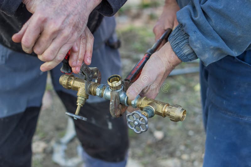 Plumbers Working Using Pipe Wrenches 2 Stock Photo - Image of equipment ...