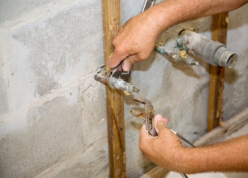 Construction Plumbing Work stock image. Image of handsome - 1418333