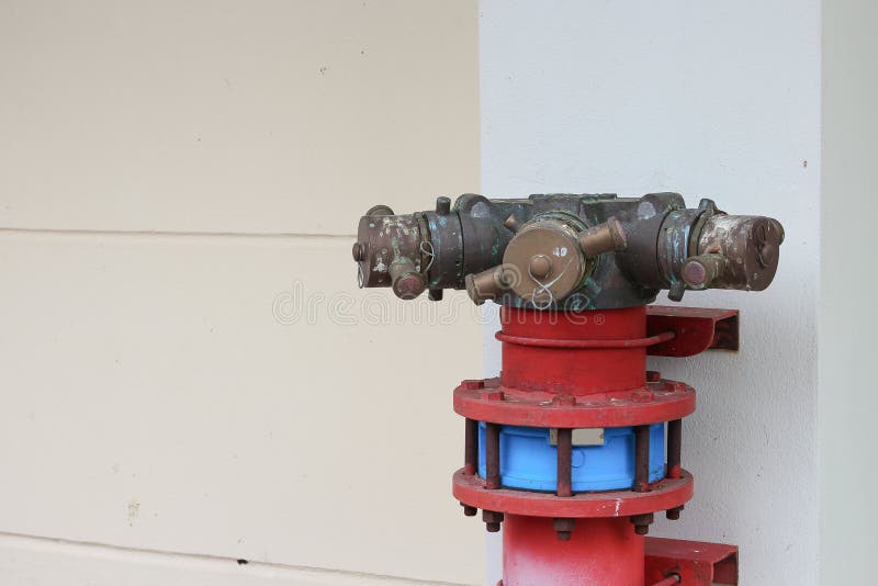 Plumbing Fire Hydrant in a Metal Line Wall Stock Image - Image of ...