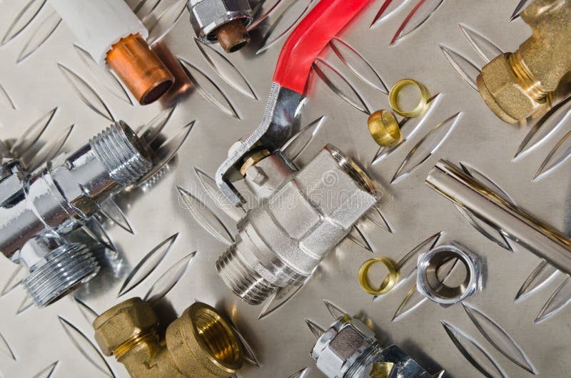 Plumbing Kit on a Metal Surface Stock Photo - Image of connector ...