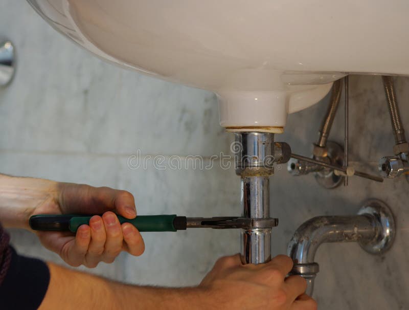 Plumbing repair service. stock photo. Image of equipment - 115323600