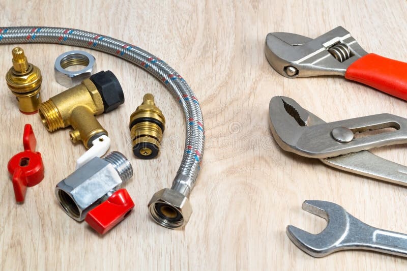 Plumbing Tools and Spare Parts on the Table. Stock Image - Image of ...