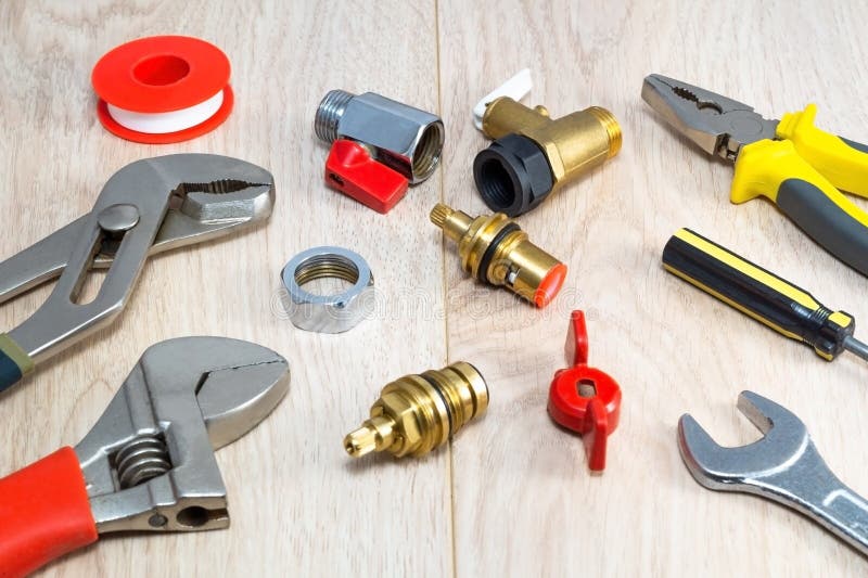 Plumbing Tools and Spare Parts on the Table Stock Photo - Image of ...