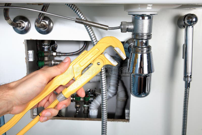 Plumbing Work with Home Water Supply System, Plumber Installs Faucet on ...