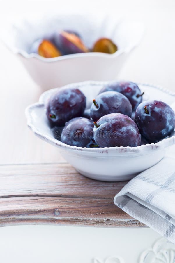 Plums stock photo. Image of food, plums, kitchen, halved - 25769566