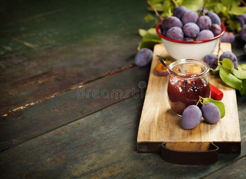 Plums and Jar of Jam on Table Stock Image - Image of canned, organic ...