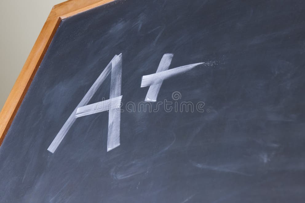 Plus grade on chalkboard stock photo. Image of back, learning - 15419280