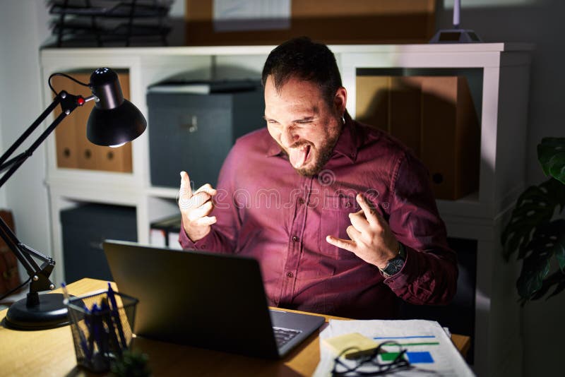 Plus Size Hispanic Man with Beard Working at the Office at Night ...