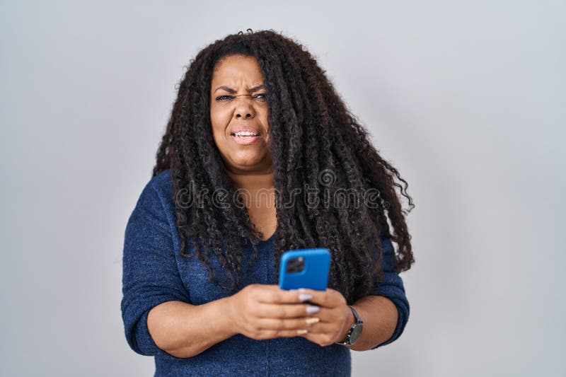 Plus Size Hispanic Woman Using Smartphone Typing Message Clueless and ...