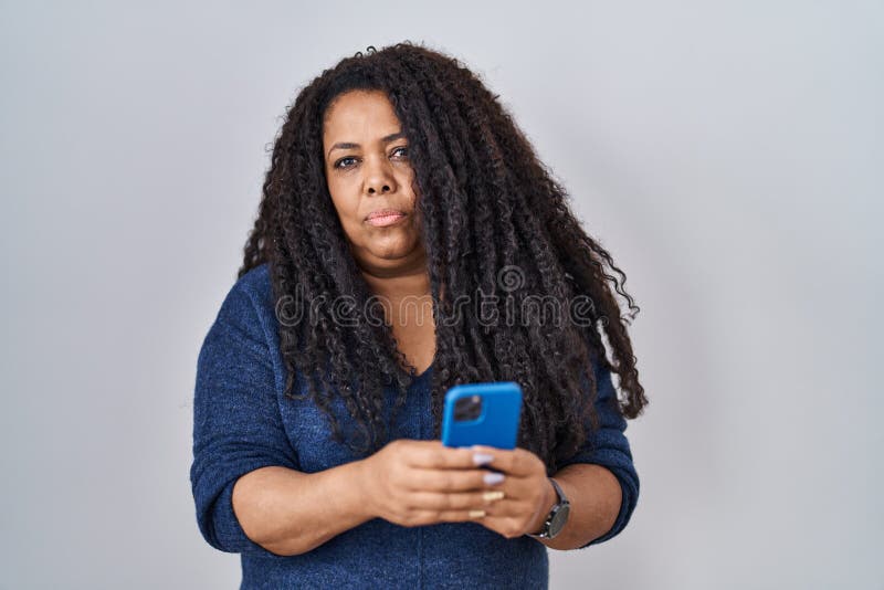 Plus Size Hispanic Woman Using Smartphone Typing Message Relaxed with ...