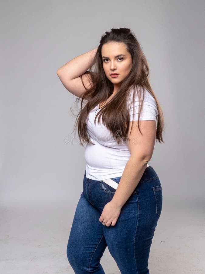 Plus Size Model with Long Hair Posing in Studio Stock Image - Image of ...