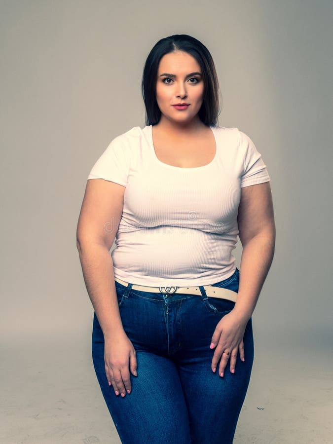 Plus Size Model with Long Hair in Studio Stock Photo - Image of ...