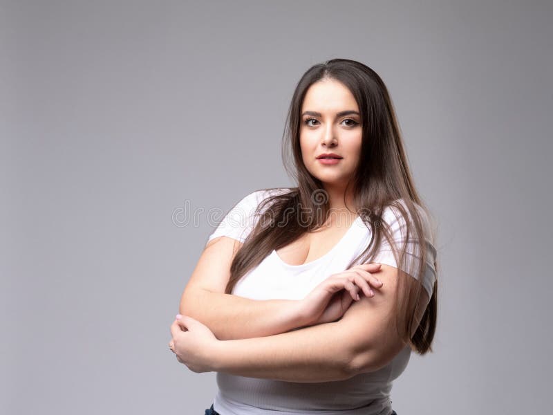 Plus Size Model with Long Hair in Studio Stock Photo - Image of young ...