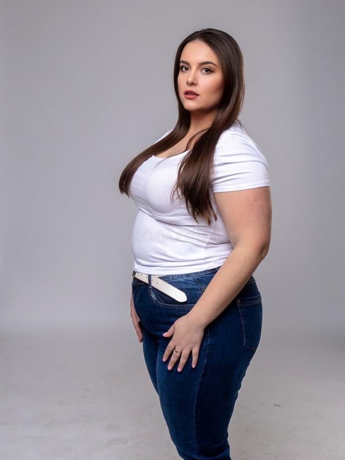 Plus Size Model with Long Hair in Studio Stock Photo - Image of young ...