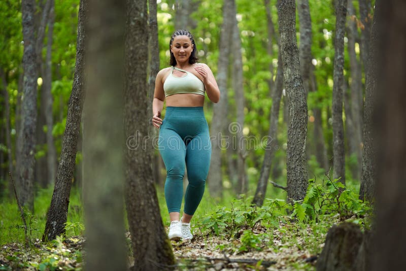 Plus Size Runner Woman in the Forest Stock Photo - Image of outdoor ...
