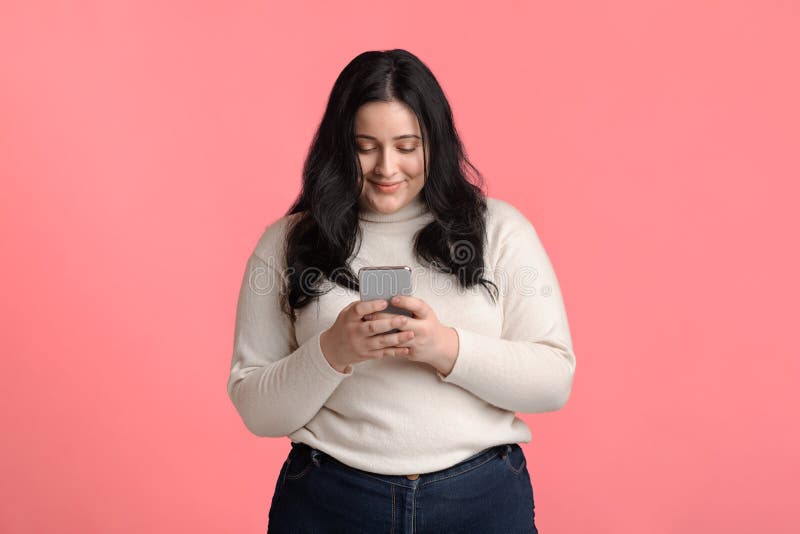 Plus Size Woman Holding Smartphone in Hands, Texting or Reading Message ...