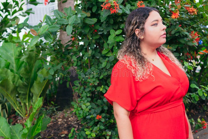 Plus-size Woman in Red Dress Walking in Park Stock Photo - Image of ...
