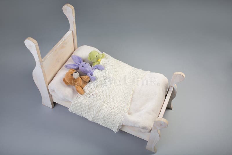 Plush toys in a bed stock image. Image of blanket, bear - 53172985