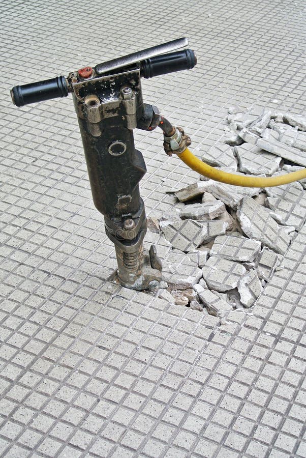 Pneumatic drill at work stock image. Image of worker - 32776955