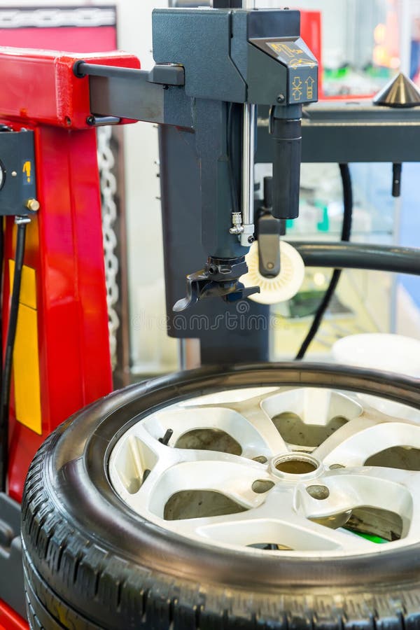 Pneumatic Machine for Tire Service, Removing Tyre Stock Photo - Image ...