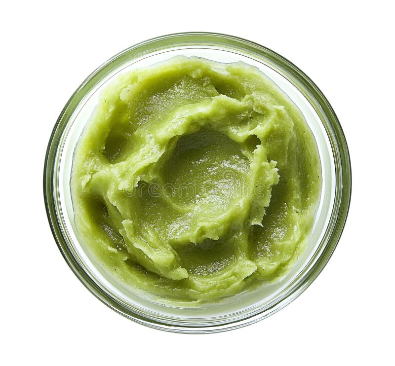 A Close-Up View of a Green Paste in a Glass Container, Isolated on ...