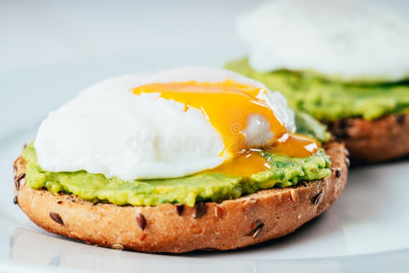 Poached Egg and Avocado Puree Toast Stock Photo - Image of freshness ...