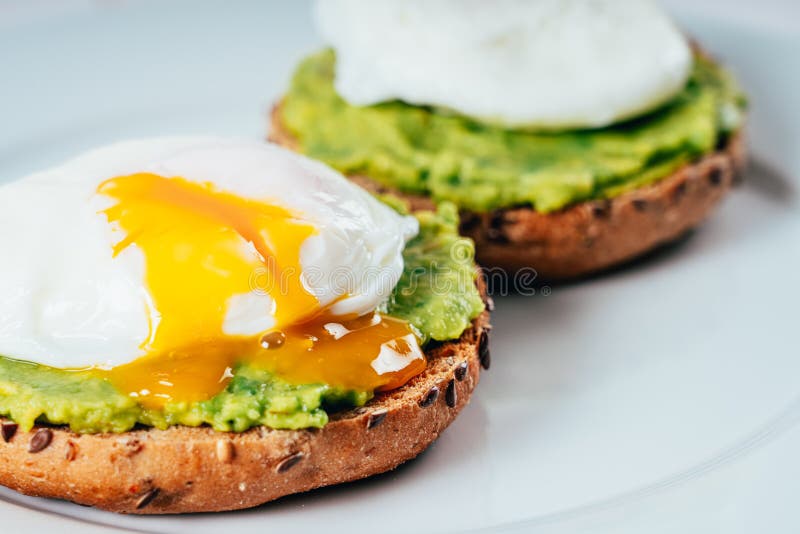 Poached Egg and Avocado Puree Toast Stock Photo - Image of freshness ...