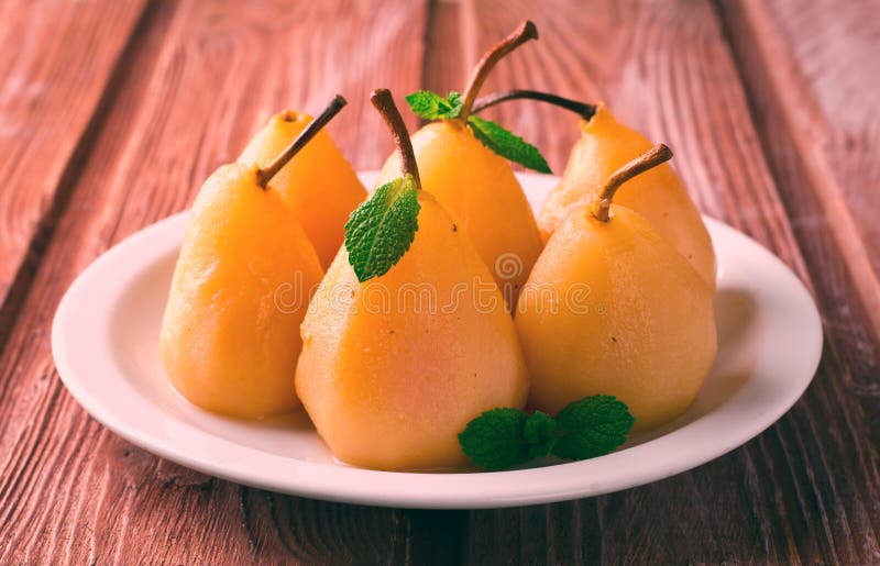Poached Pears with Mint on White Plate Stock Image - Image of fruit ...