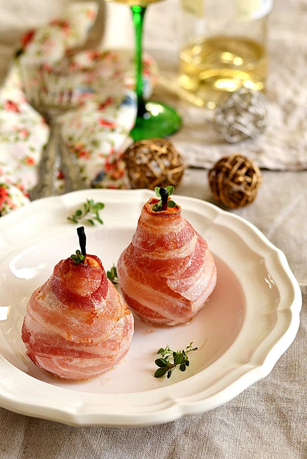 Poached Pears Wrapped in Bacon with Blue Cheese Stock Photo - Image of ...