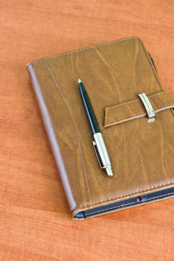 Pocket planner and pen stock photo. Image of table, plan - 11273226