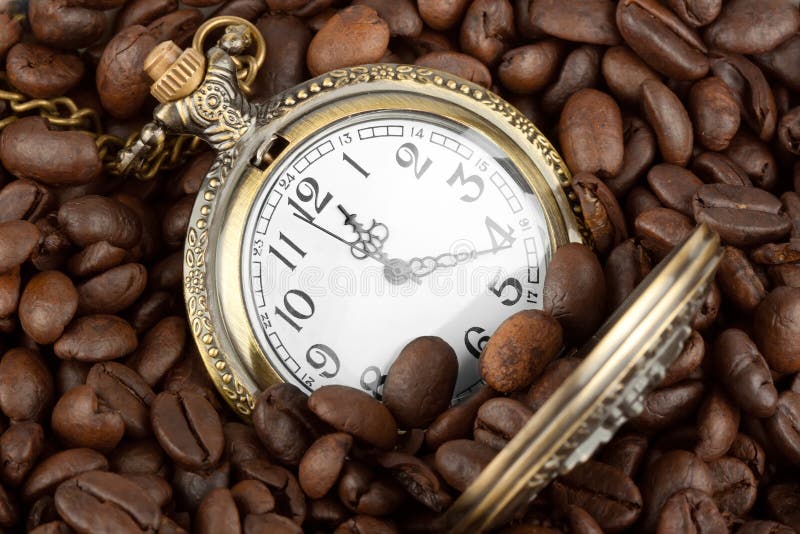 Pocket watch in coffee stock image. Image of minute, grain - 23589207