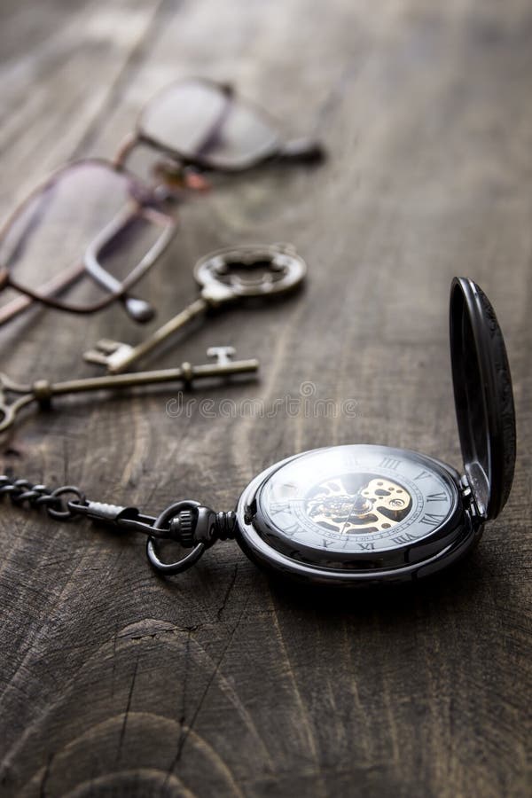 Pocket Watch on Grunge Wooden Table Stock Photo - Image of textured ...