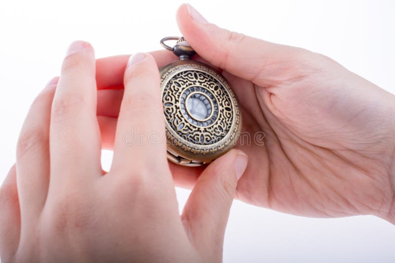 Pocket watch in hand stock image. Image of watch, styled - 70041543