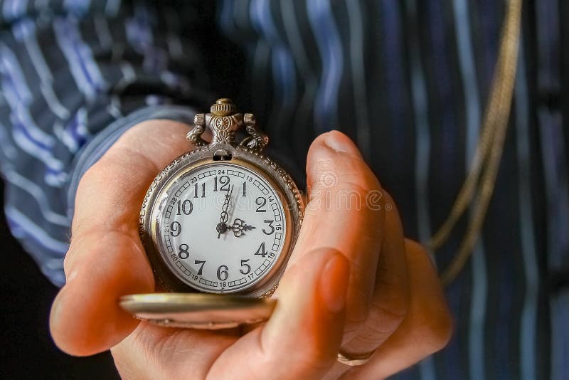 A Pocket Watch in the Hands of a Man Stock Photo - Image of clock, aged ...