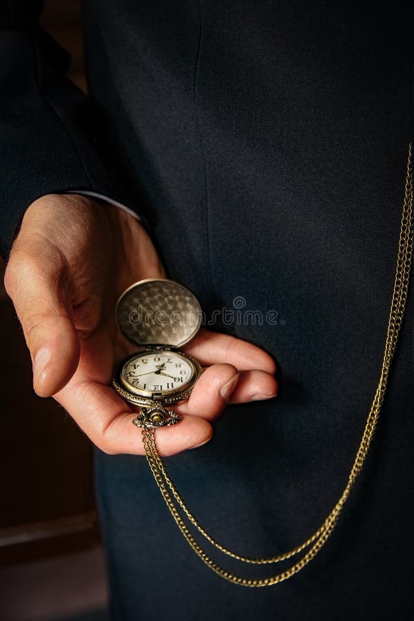 A Pocket Watch in the Hands of a Man Stock Photo - Image of minute ...
