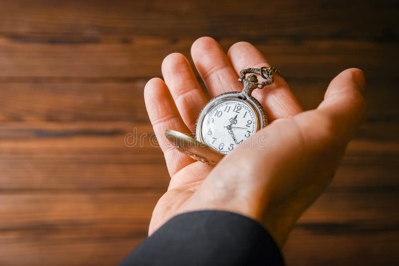 A Pocket Watch in the Hands of a Man Stock Photo - Image of gold ...