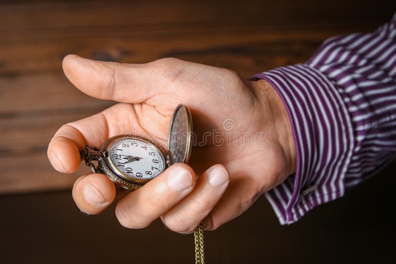 A Pocket Watch in the Hands of a Man Stock Photo - Image of design ...