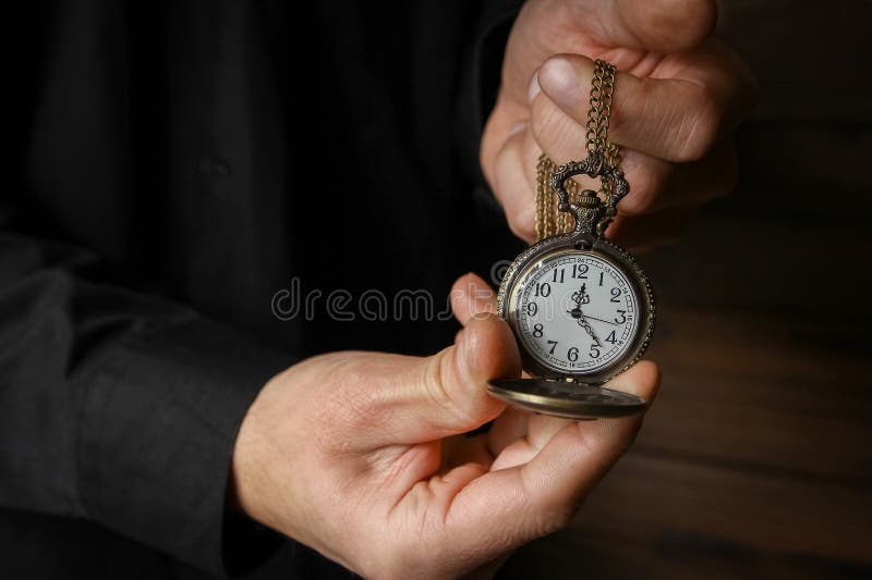 A Pocket Watch in the Hands of a Man Stock Photo - Image of hand ...