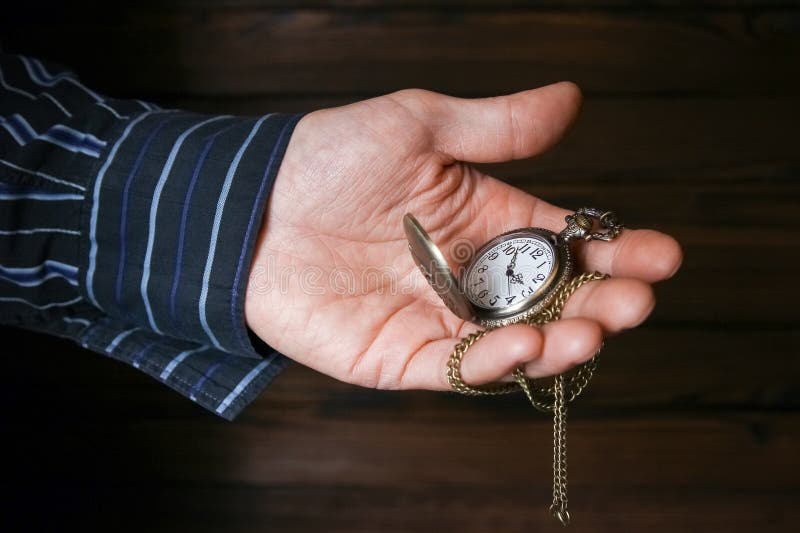 A Pocket Watch in the Hands of a Man Stock Photo - Image of gold, clock ...