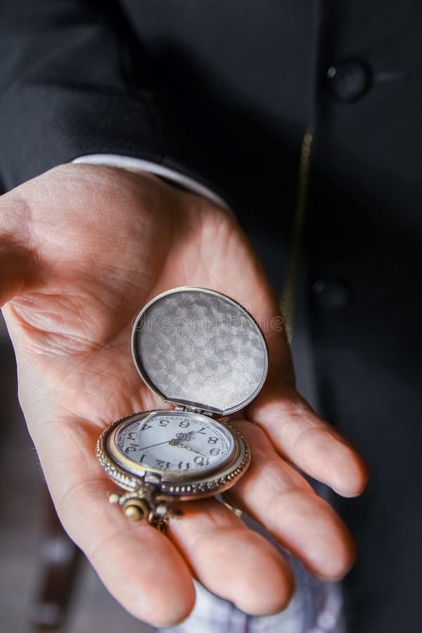 A Pocket Watch in the Hands of a Man Stock Photo - Image of equipment ...