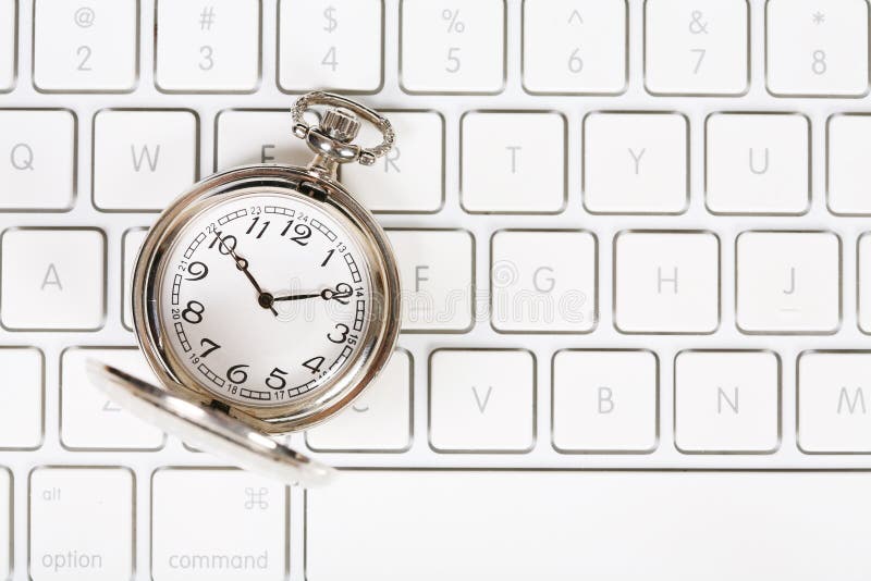 Pocket watch with keyboard editorial stock image. Image of electronic ...