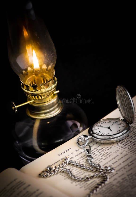 Pocket watch and lamp stock photo. Image of color, dark - 10331542