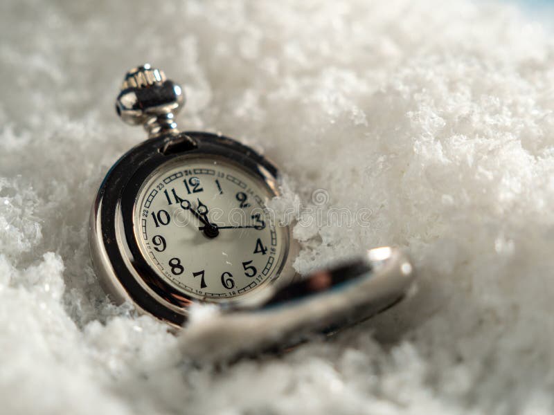 The Pocket Watch Lies on the Snow. Stock Photo - Image of hour, date ...