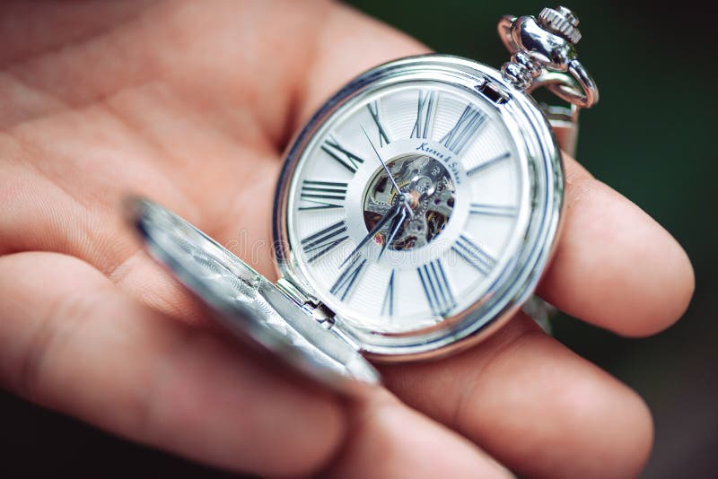 Pocket watch in man hand editorial photo. Image of elegant - 228710281