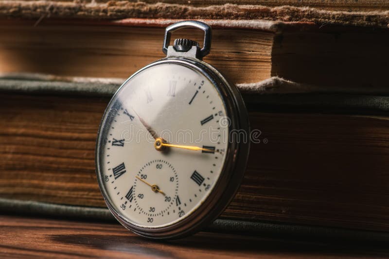 Pocket Watch and Old Book in Vintage Style Stock Image - Image of ...
