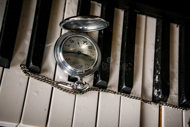 Watch on the Piano Keyboard. Concept of the Time and Music Stock Photo ...