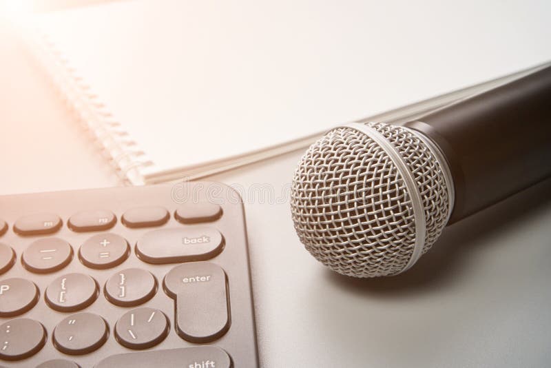 Podcast Concept. White Notebook with Blank Sheet. Microphone and ...